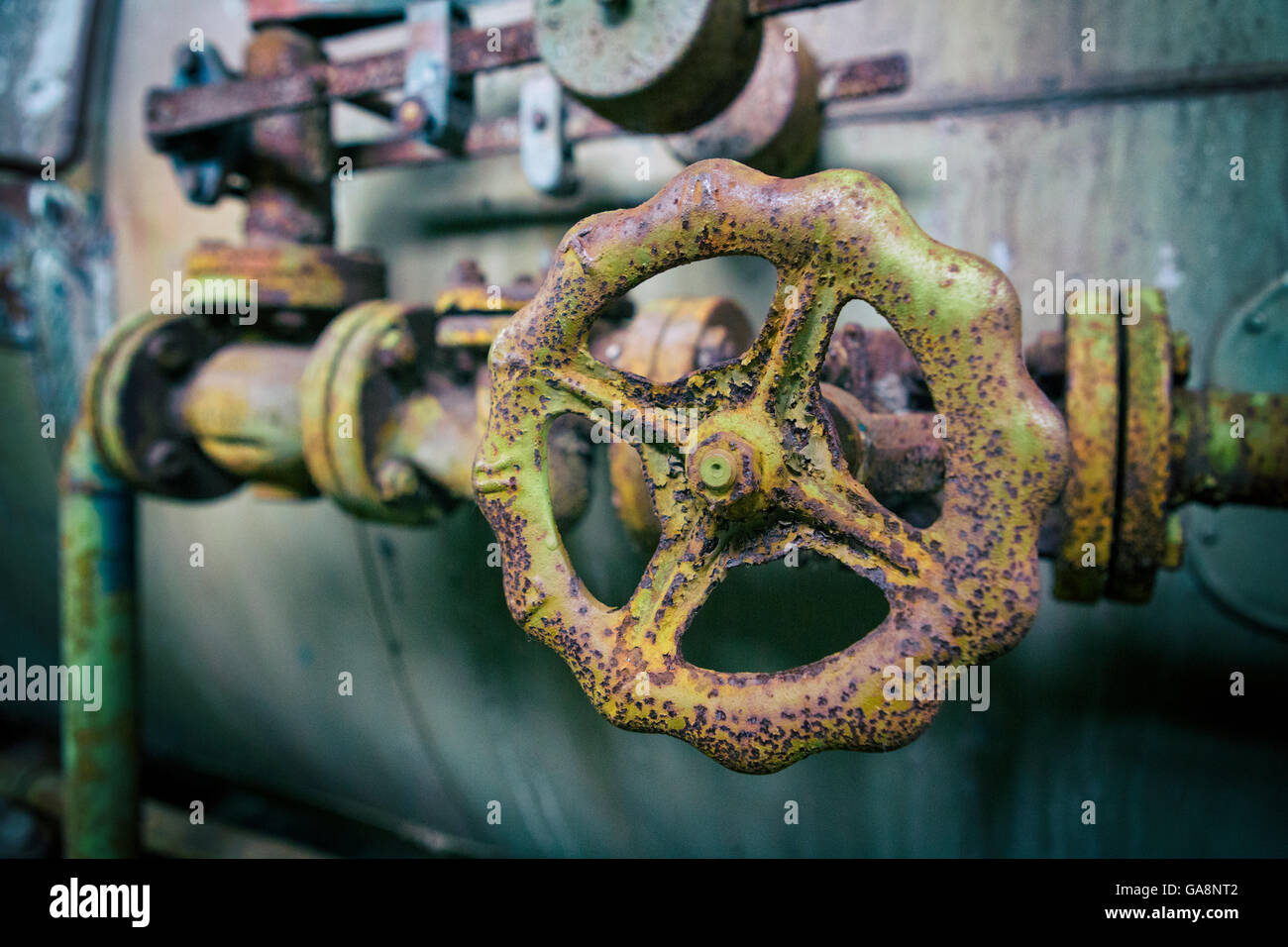 tap at old industrial installation Stock Photo - Alamy
