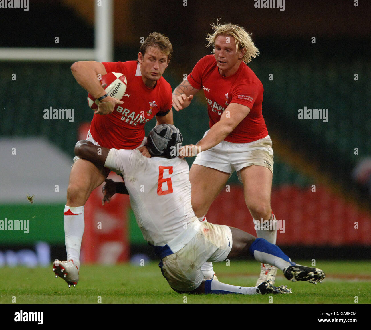 Wales jamie robinson tackled by frances serge betsen hi-res stock ...