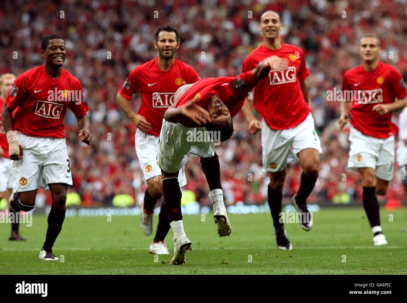 Manchester United's Luis Nani (centre) celebrates in style in front of ...