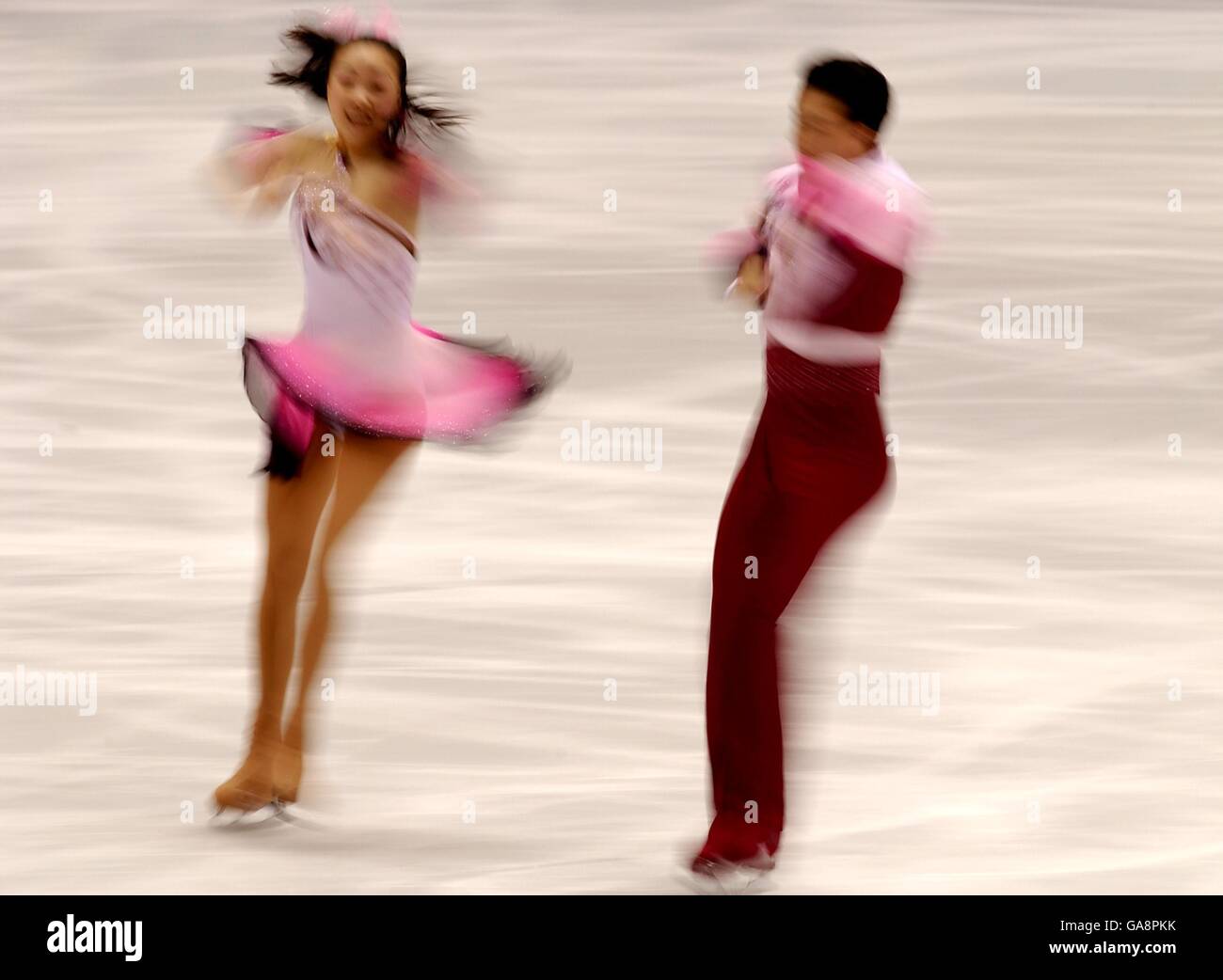 China's Weina Zhang and her partner Xianming Cao in action during their ...