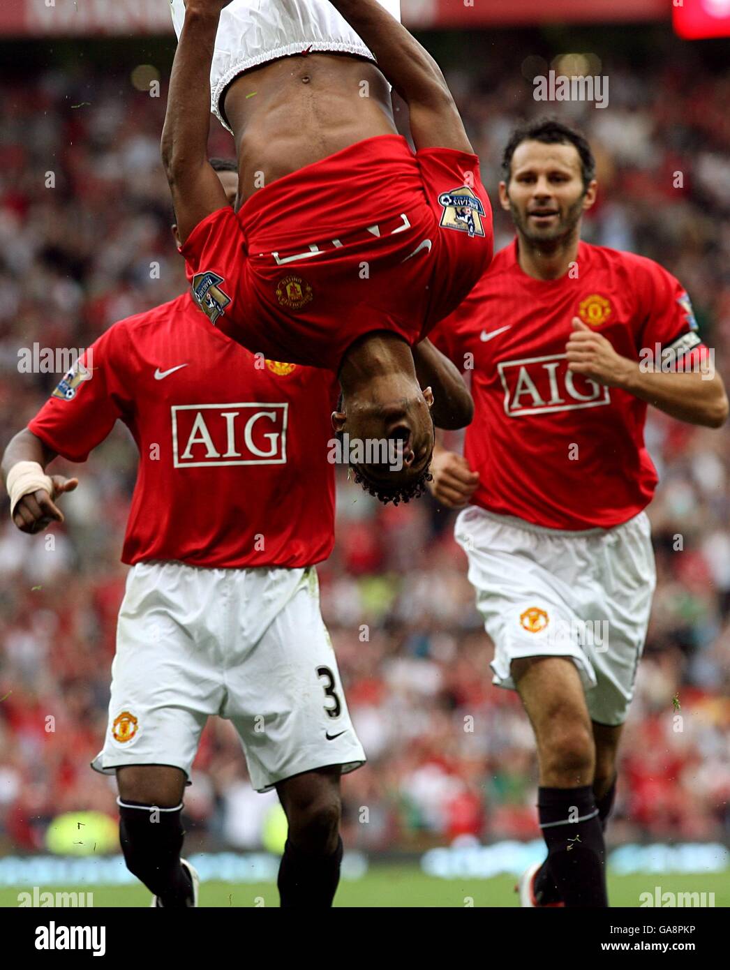 Manchester United's Luis Nani (centre) celebrates in style in front of ...