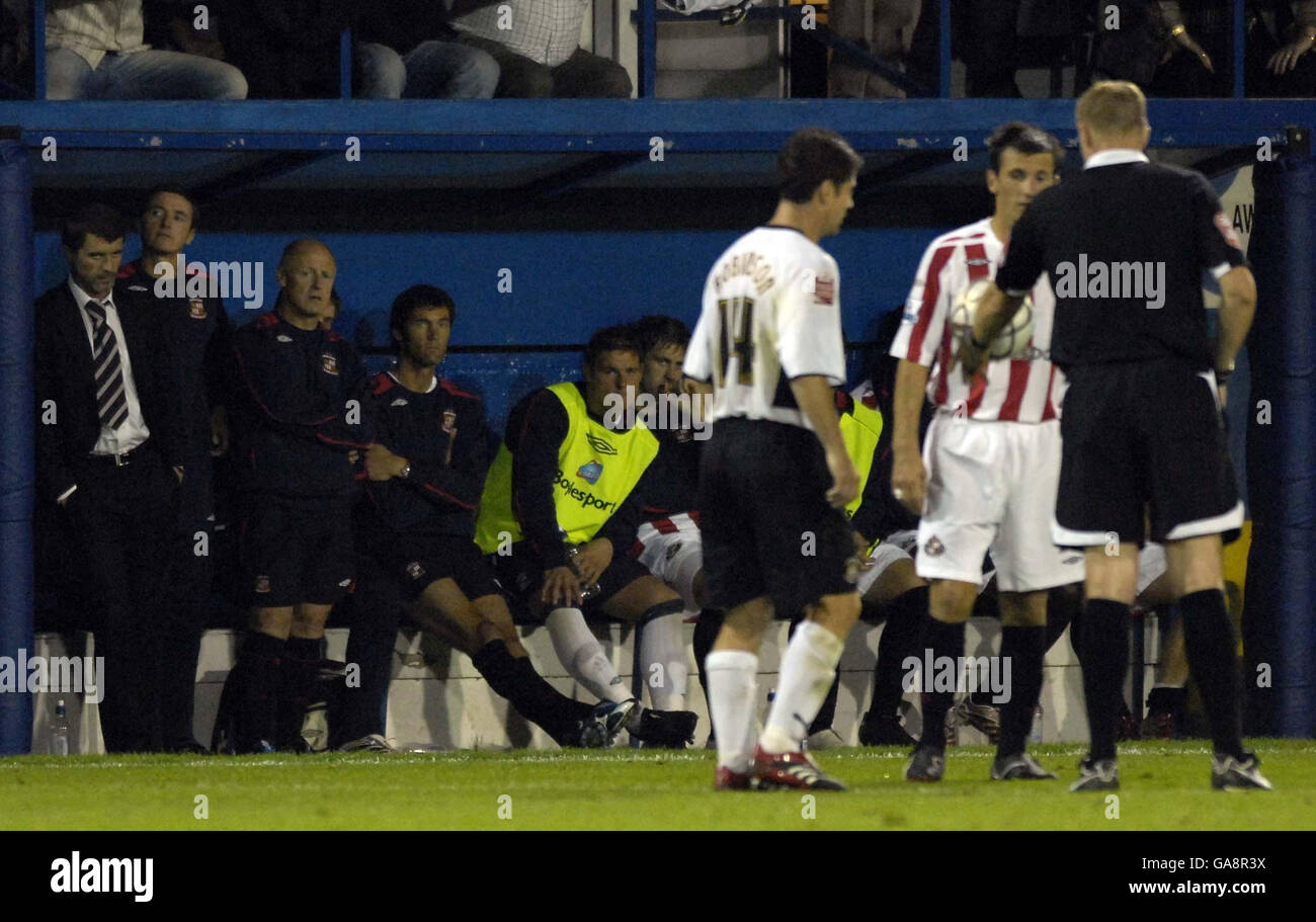 Roy Keane (far left) and the Sunderland bench look on as Sunderland ...