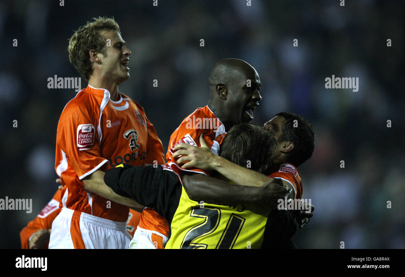 Blackpool's goalkeeper Rhys Evans and Michael jackson (r) who scored ...