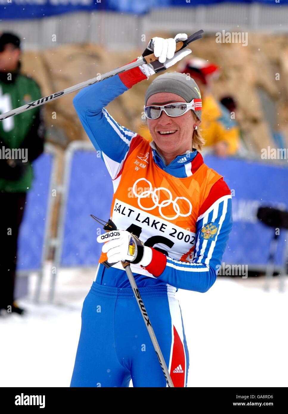 Russia's Larissa Lazutina celebrates her first placed finish only to ...