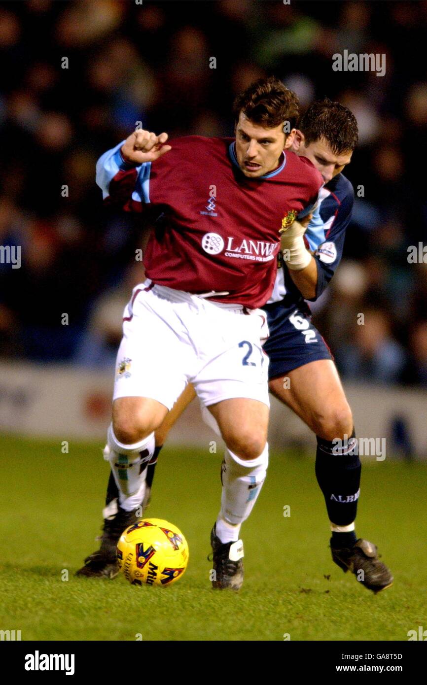West Bromwich Albion's Phil Gilchrist (r) shadows Burnley's Robbie ...
