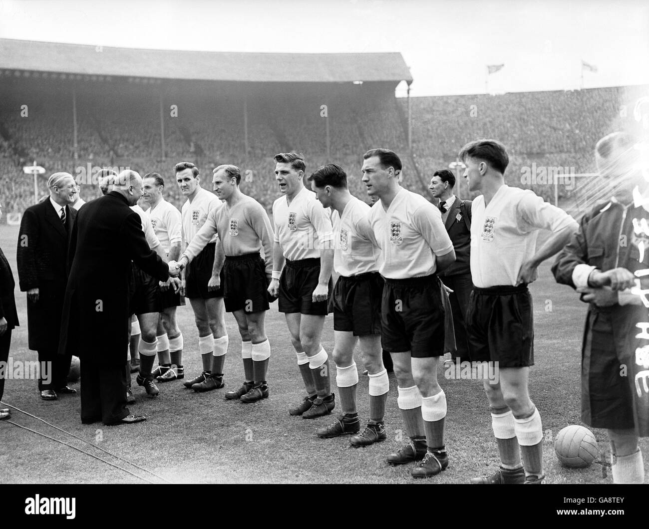 The Duke of Gloucester (l) shakes hands with England goalkeeper Bert ...