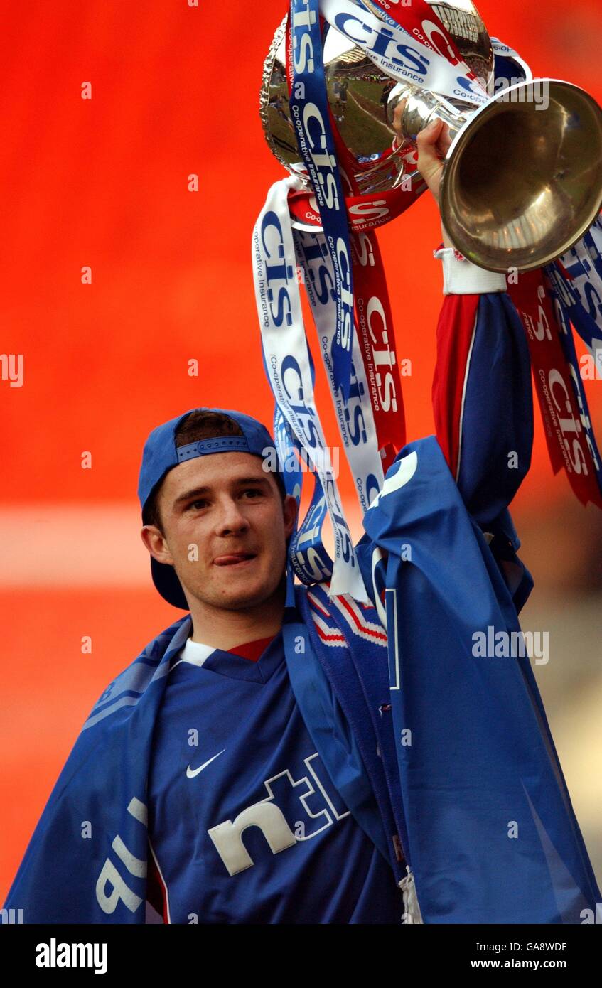 Rangers' Barry Ferguson holds the CIS Insurance trophy after defeating ...