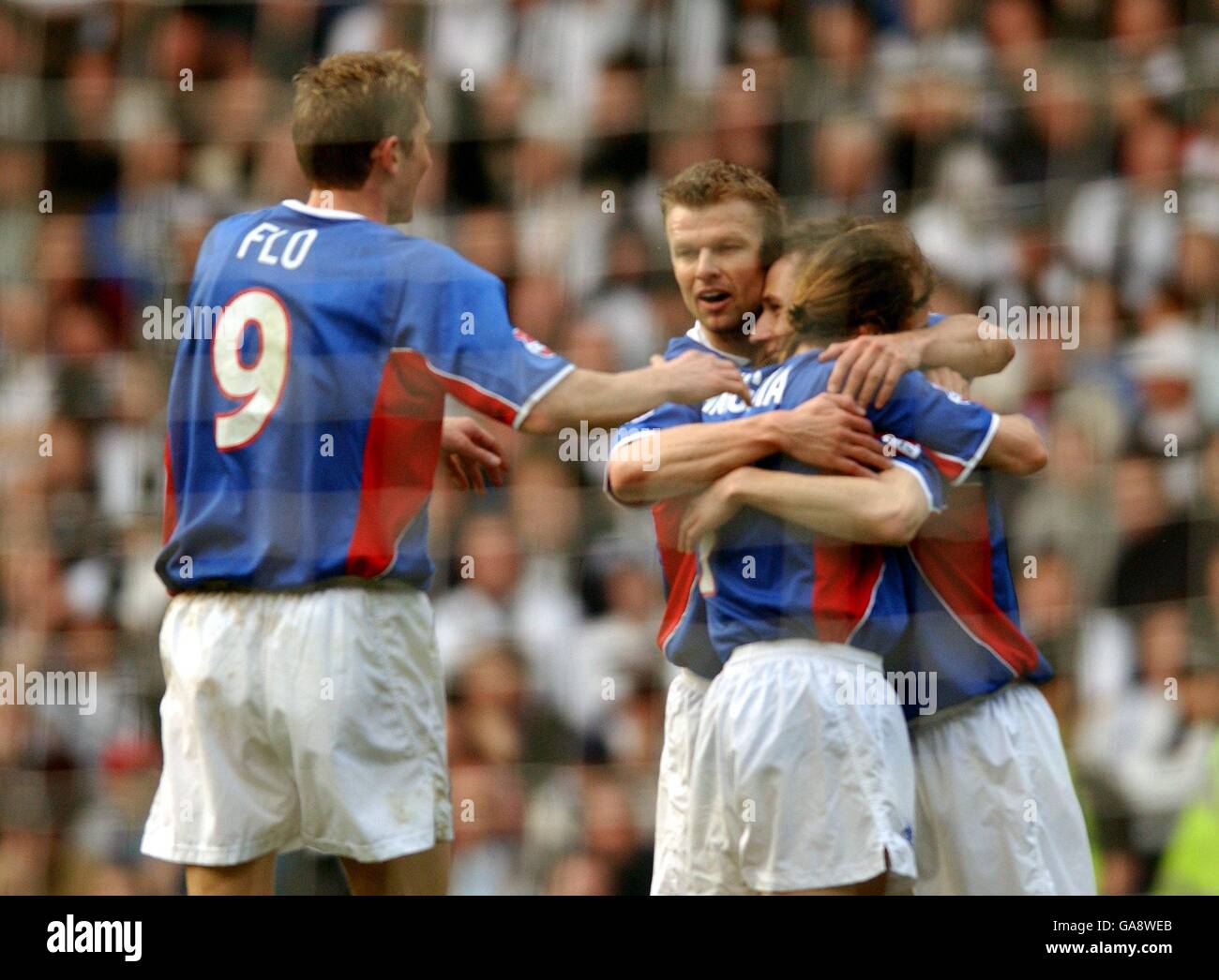 Glasgow Rangers' players hug Claudio Caniggia after he scored the third ...