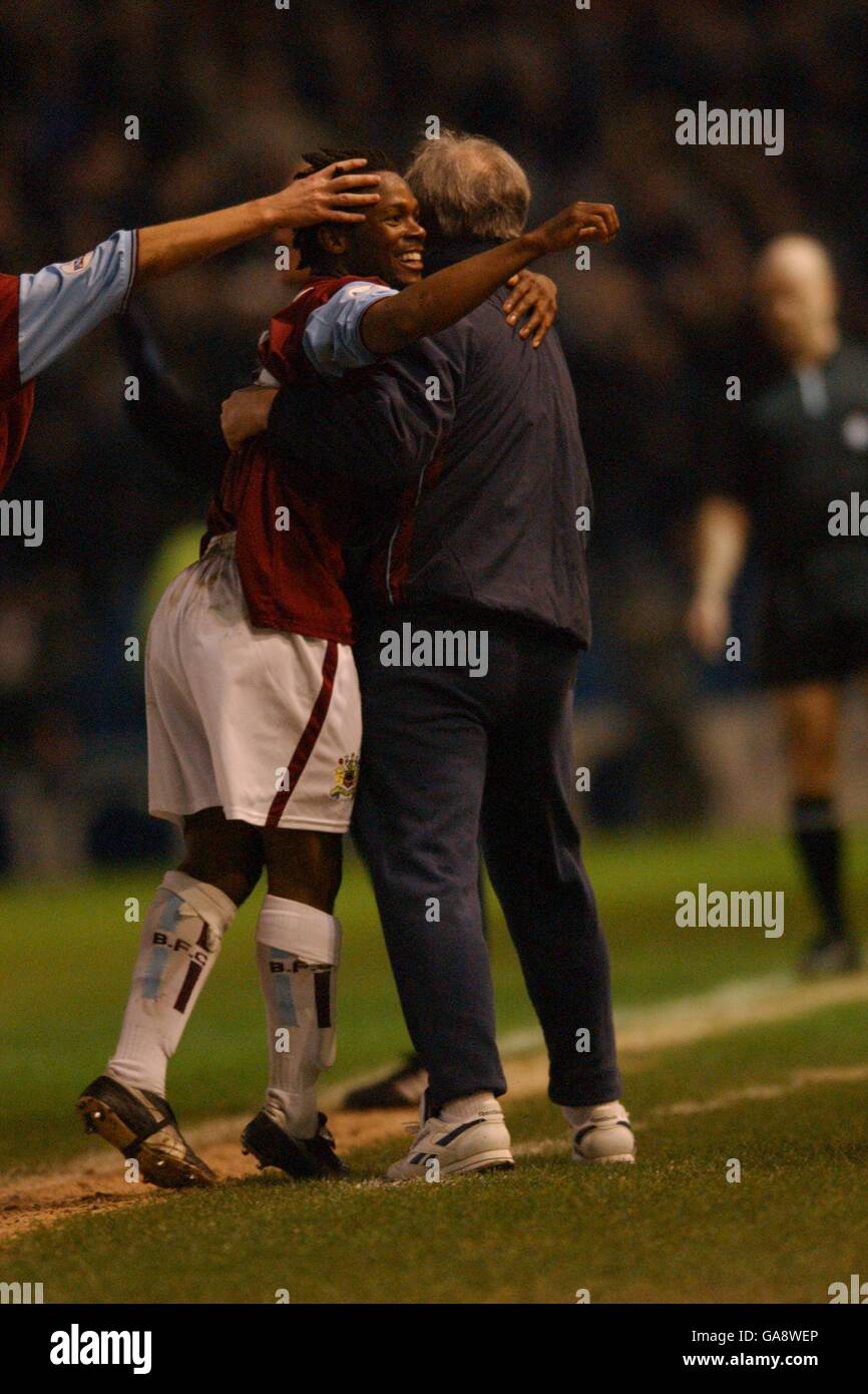 Burnley's David Johnson celebrates his goal with his manager Stan ...