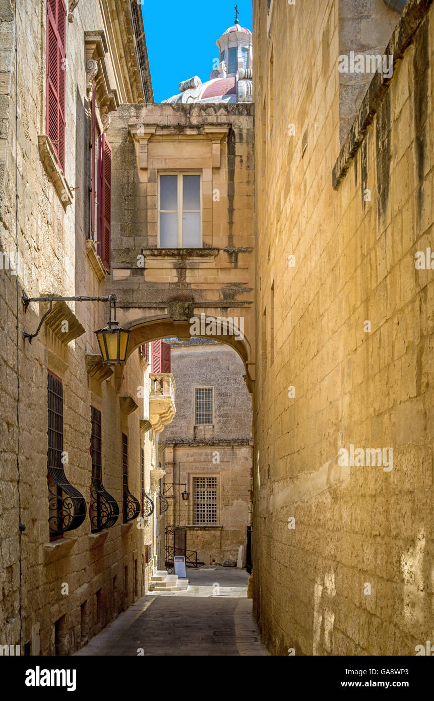 Peaceful, narrow, shady street in the Silent City of Mdina Stock Photo ...