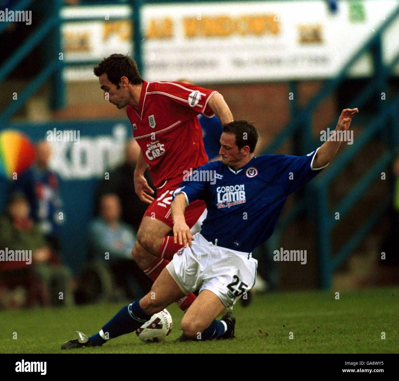 Cardiff citys peter thorne is tackled by chesterfields david dauria hi ...