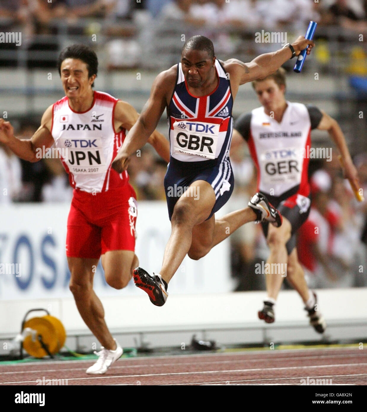 Great Britain's Mark Lewis Francis crosses the line to win bronze in ...