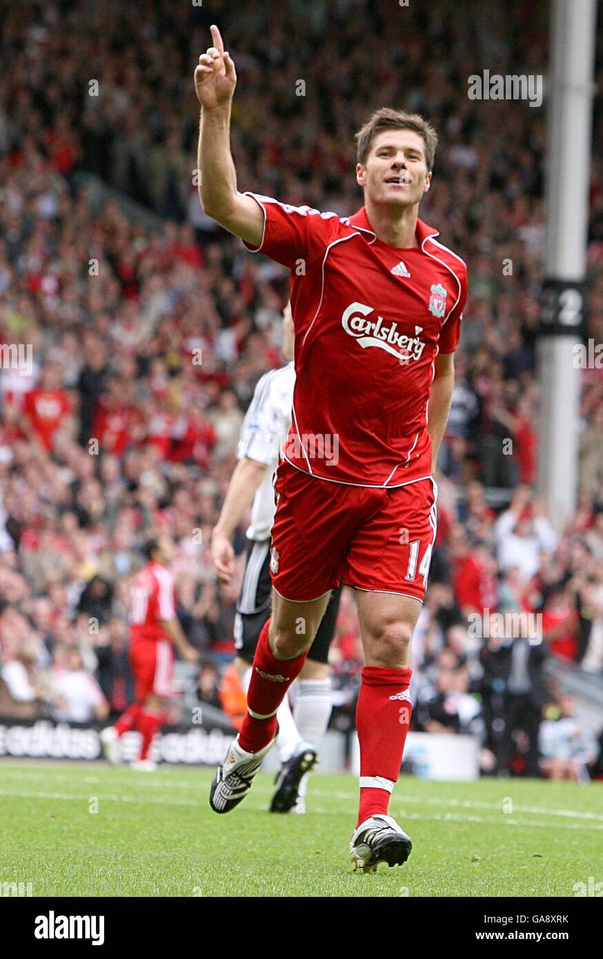 Liverpool's Xabi Alonso celebrates after scoring the fourth goal Stock ...