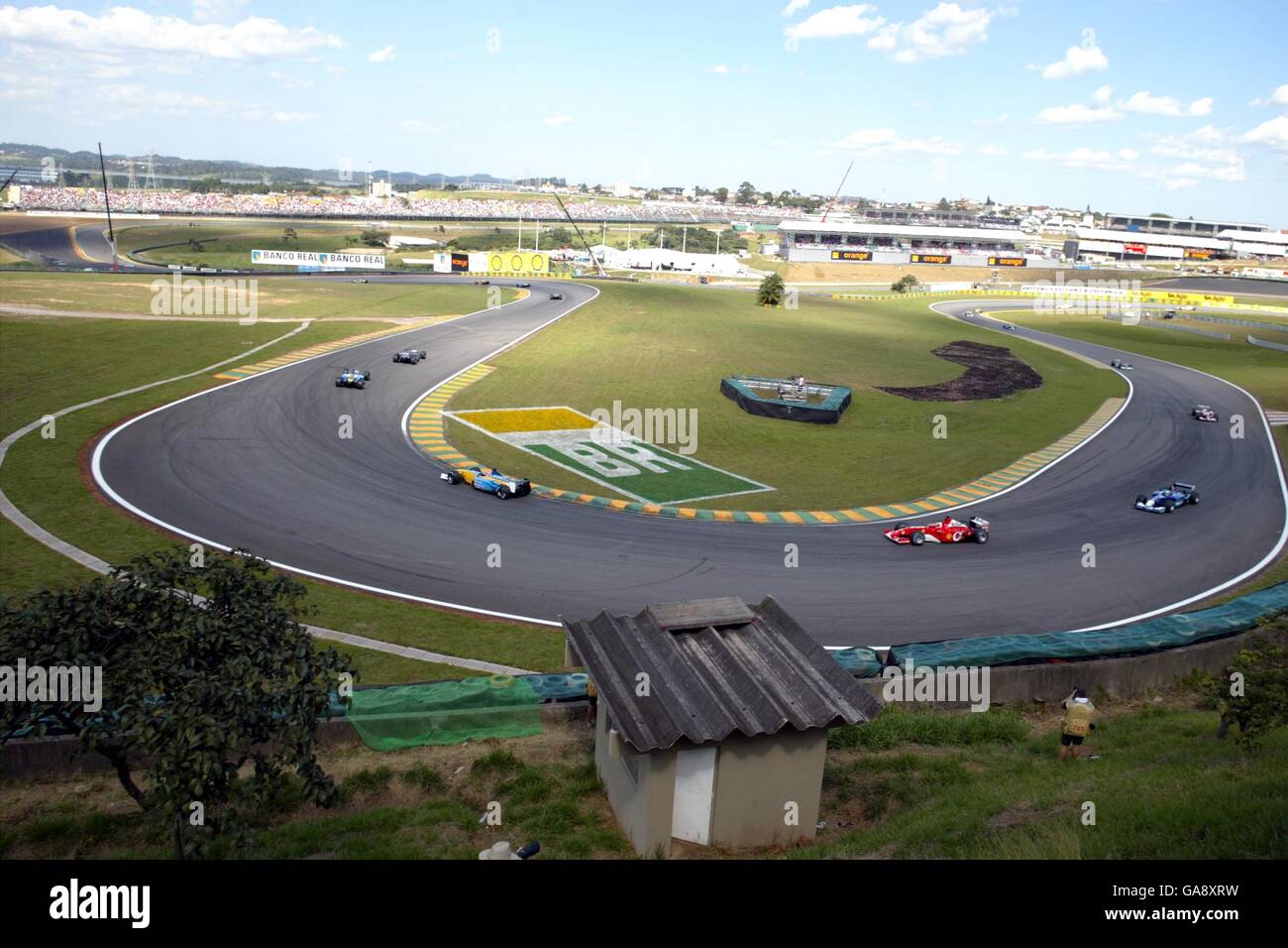 The cars stretch out at the start of the race hi-res stock photography ...