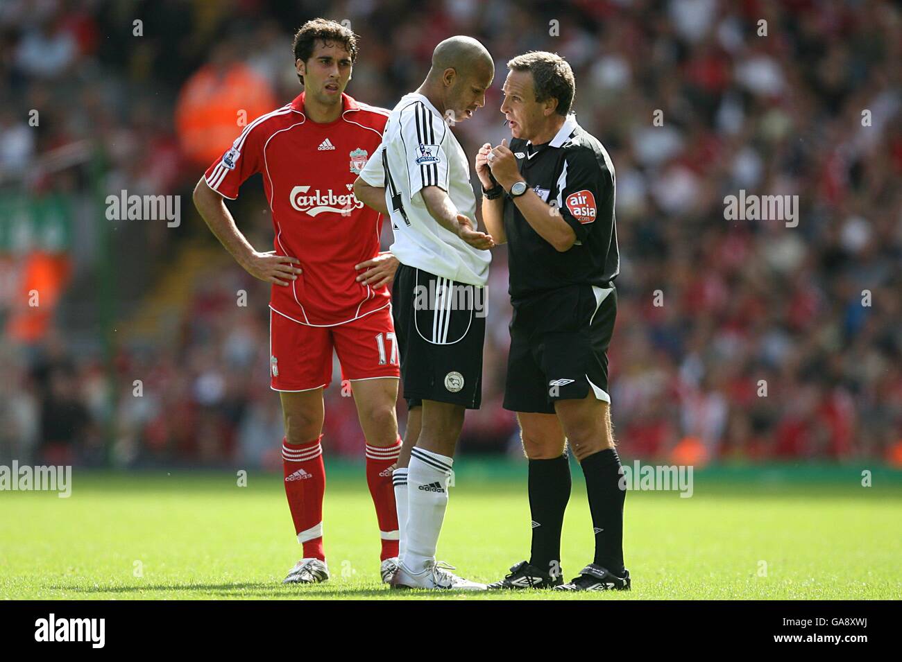 Referee Alan Wiley has a word with Derby County's Tyrone Mears ...