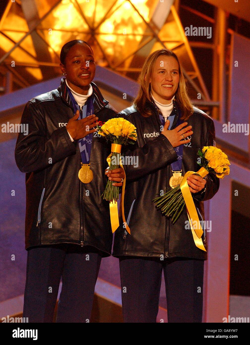 l-r; Brakewoman Vonetta Flowers who became the first black athlete to ...
