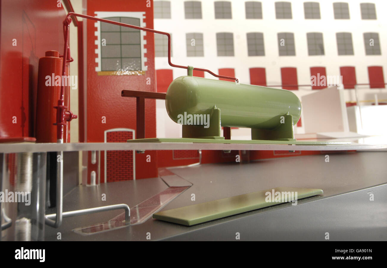 A model showing the Liquid Petroleum Gas (LPG) tank and the underground ...