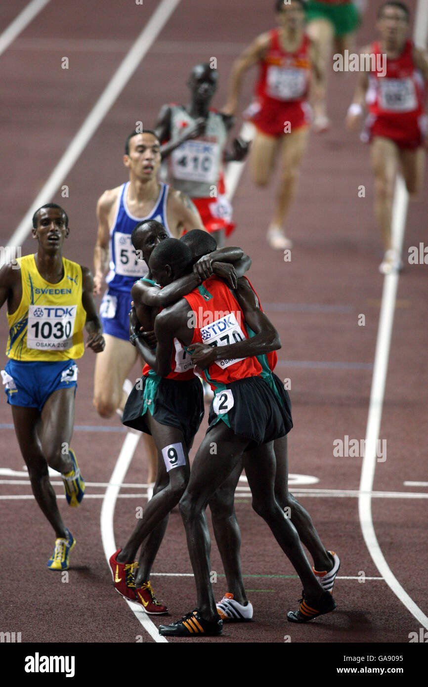The Kenyan runners hug each other after the Men's 3000m Steeplechase ...