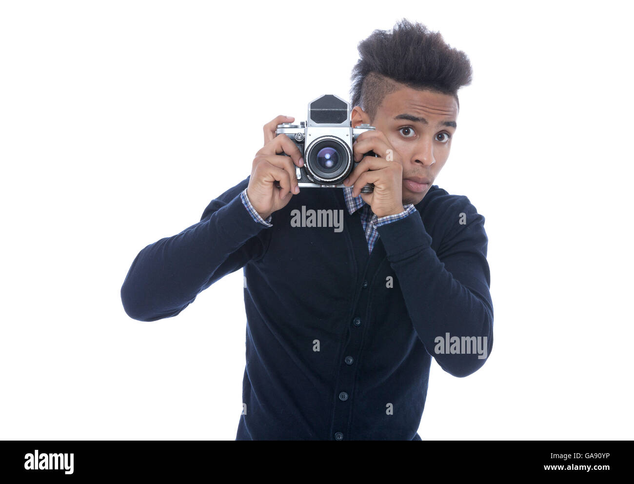 Young african man holding an old camera peeking on what he sees Stock ...
