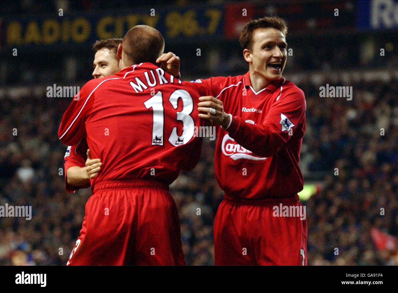 Vladimir Smicer of Liverpool shows off Danny Murphy's number 13 shirt ...