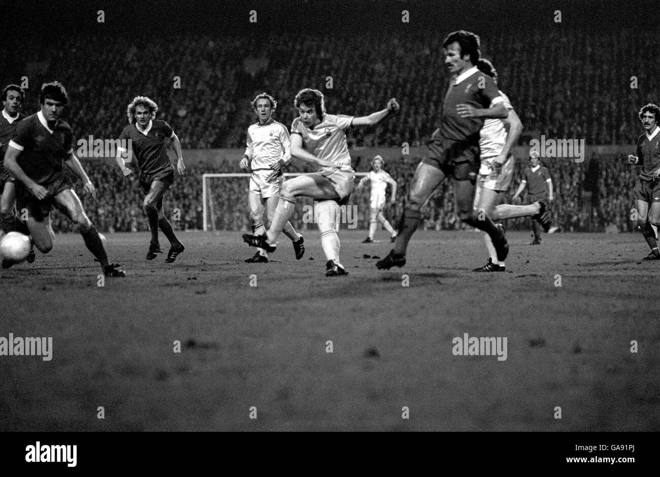 Nottingham Forest's Tony Woodcock (fifth l) fires in a shot, watched by ...