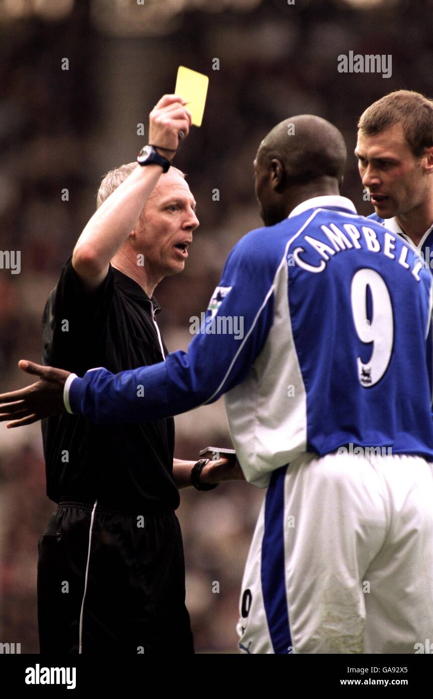 Referee neale barry shows yellow card hi-res stock photography and ...