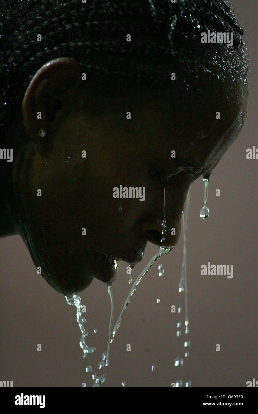 Meseret Defar cools down after winning gold in the 5000 metres during ...