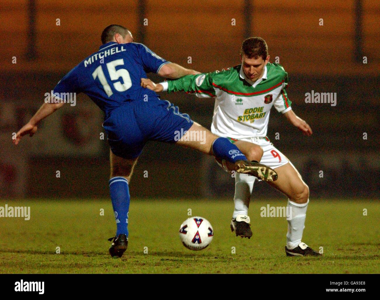 Halifax Town's Graham Mitchell and Ian Stevens of Carlisle United ...