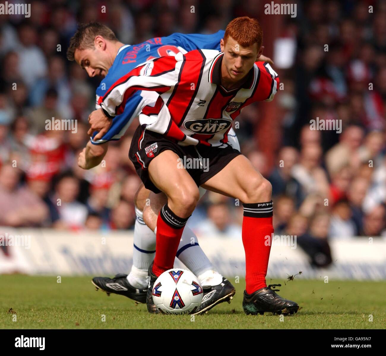 Brentfordssteve sidwell and readings nicky forster battle for the ball ...