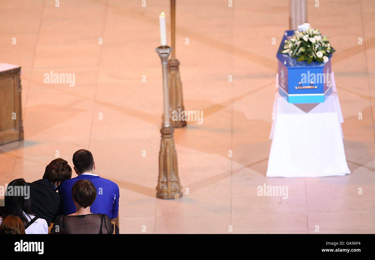 Steve and Melanie Jones comfort each other as the funeral of their son ...