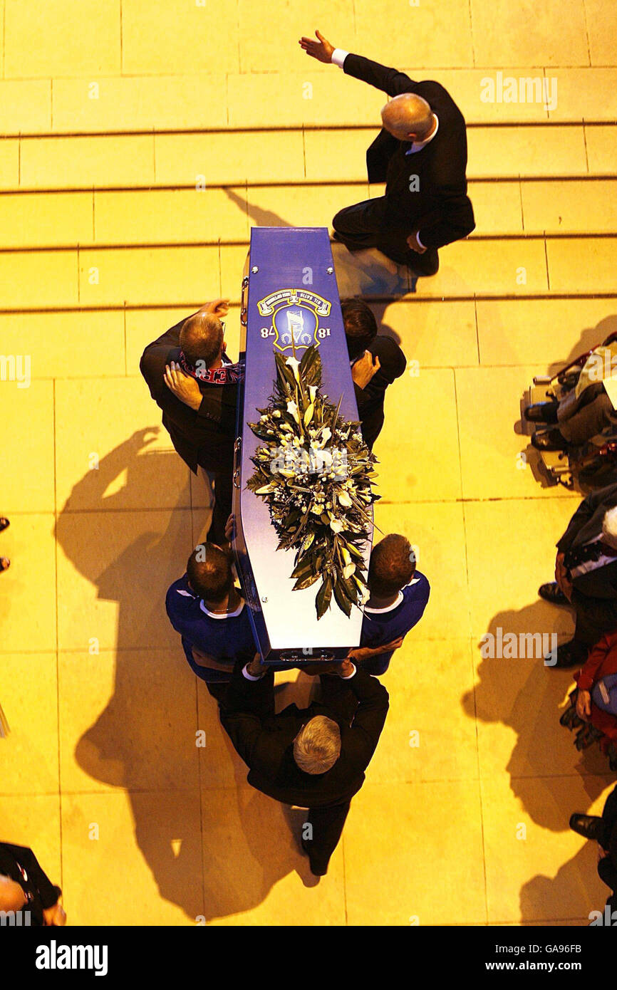 The coffin of Rhys Jones is carried out of Liverpool's Anglican ...