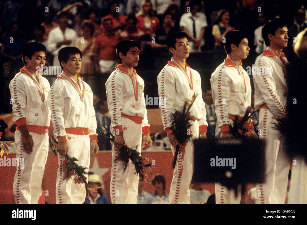 The Chinese team winning the silver medal in the Team Competition Stock ...