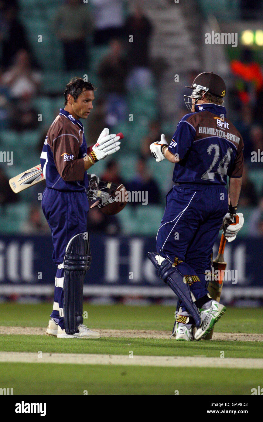 Surrey Brown Caps' Mark Ramprakash celebrates his century with teammate ...