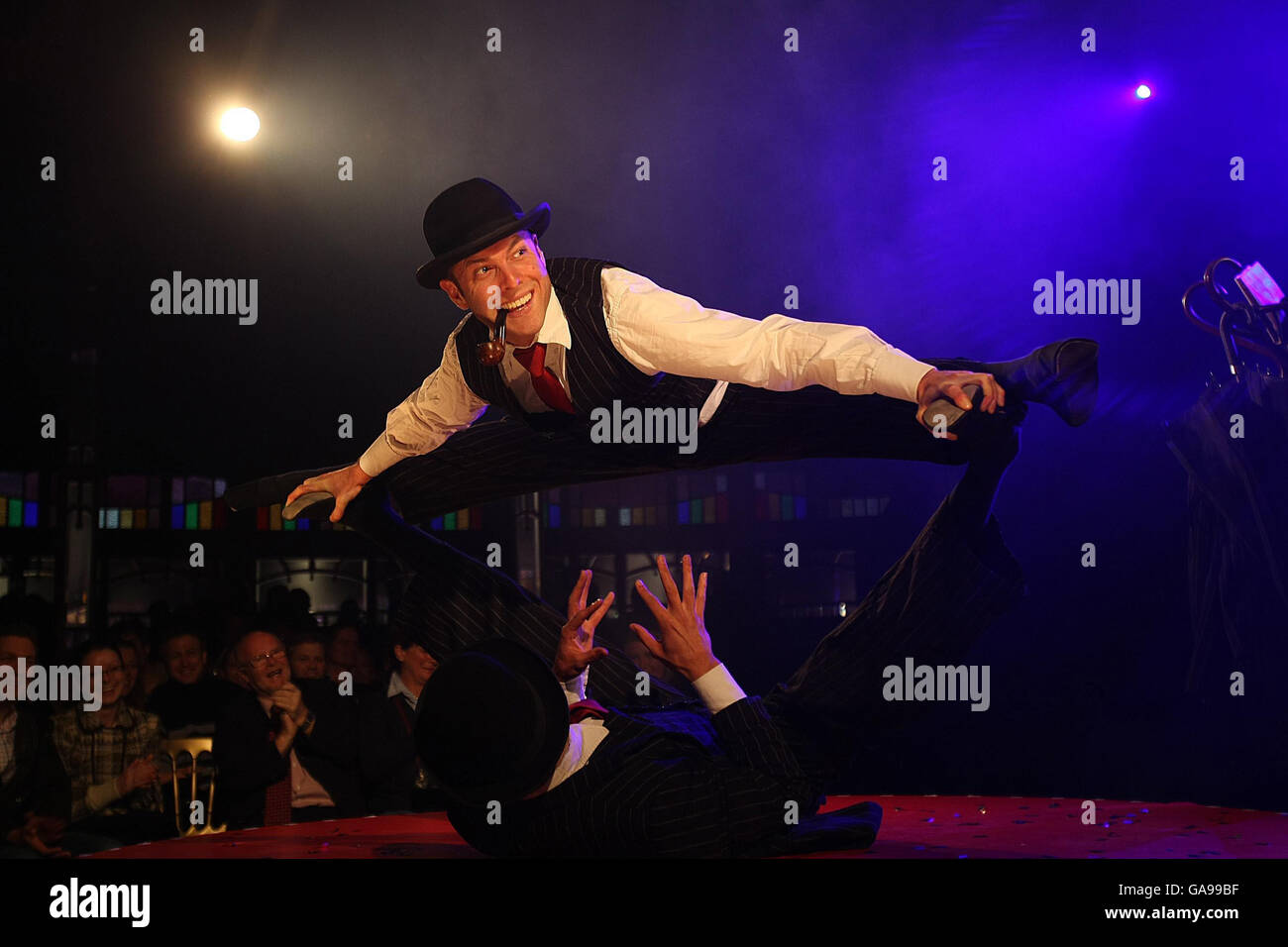 Standalone photo an acrobat during a performance of la clique hi-res ...