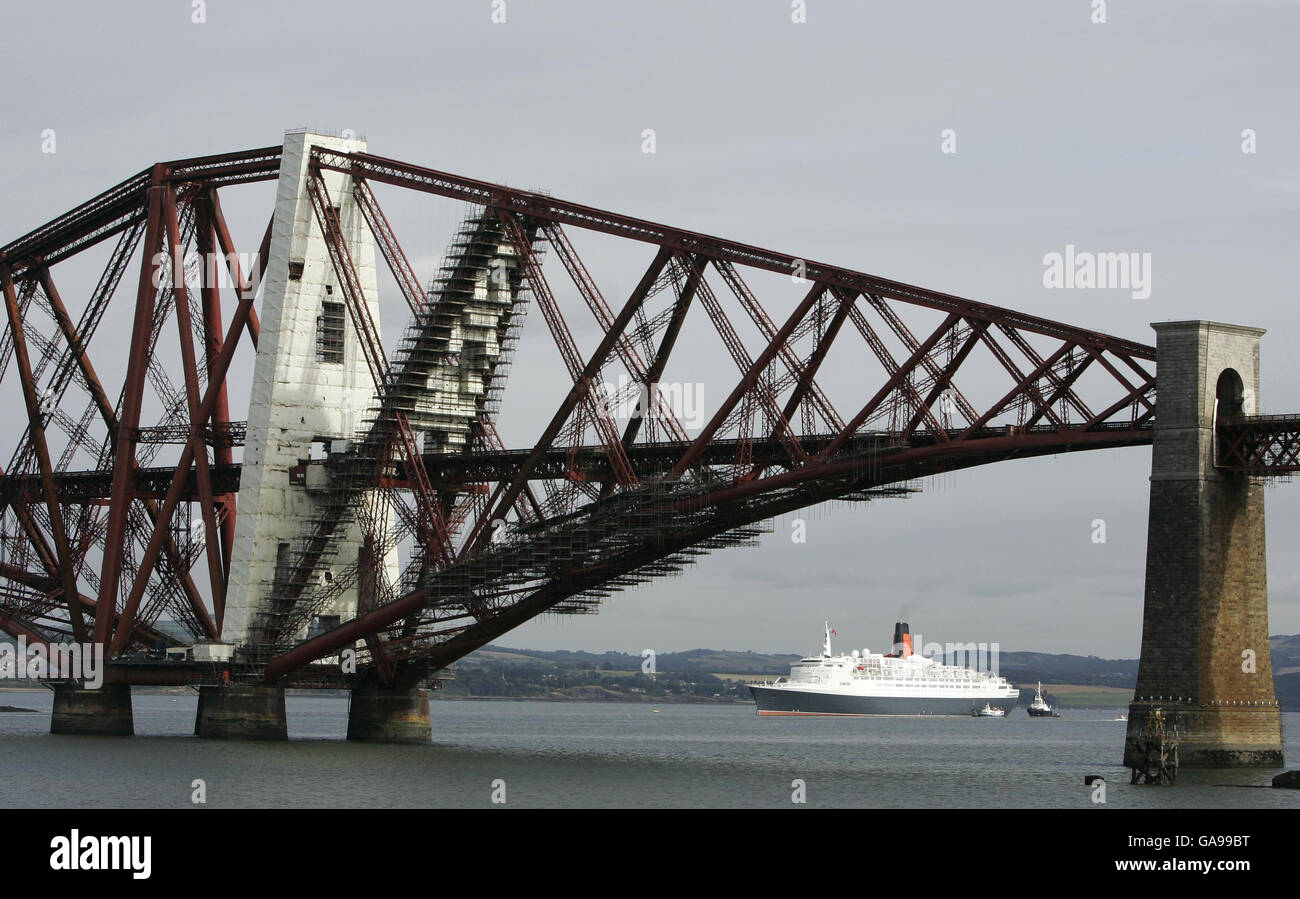 Famous ship docks beside landmark bridge Stock Photo - Alamy