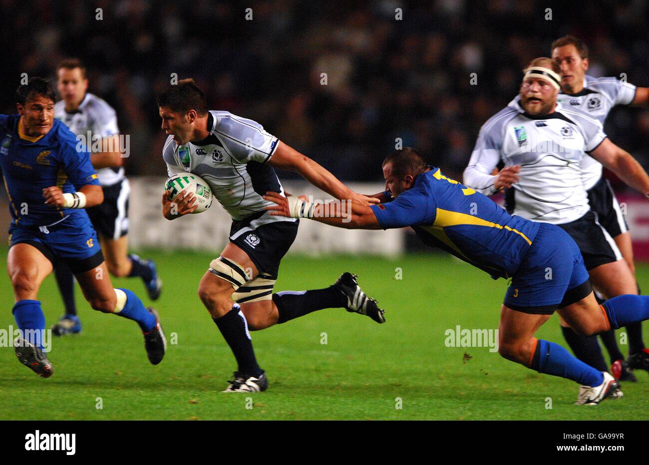 Scotland's Allister Hogg breaks away from Romania's Bogdan Balan Stock ...