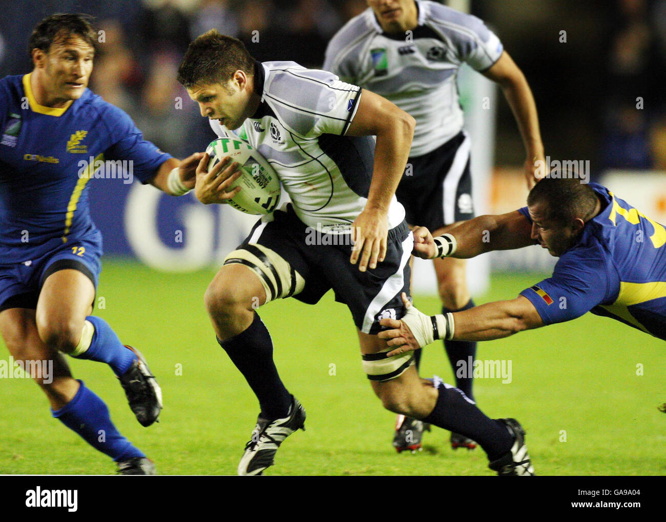Scotland's Allister Hogg holds off Romania's Bogdan Balan during the ...