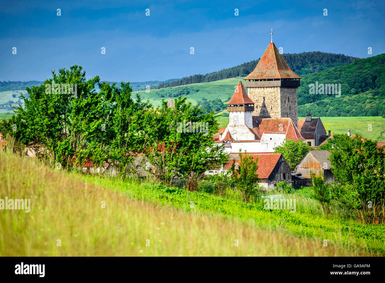 Fortified church in the medieval village hi-res stock photography and ...
