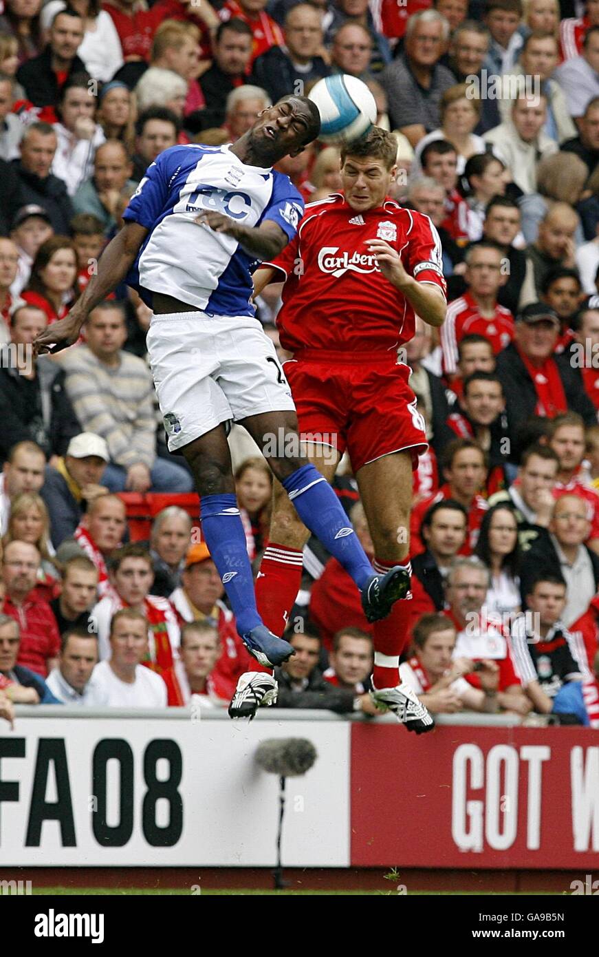 Liverpool's Steven Gerrard (right) and Birmingham City's Olivier Kapo ...