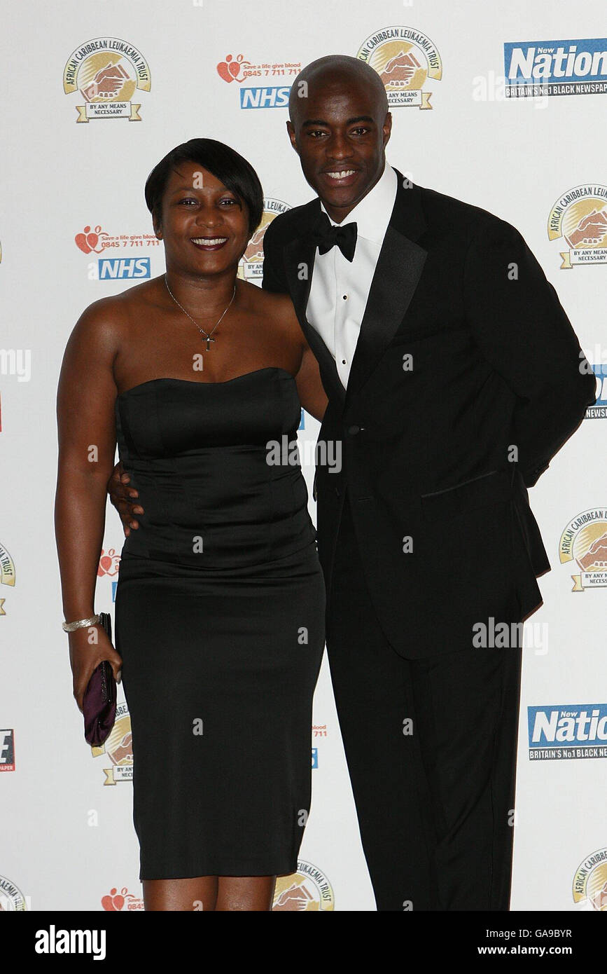 Tim Campbell and guest arriving for the African Caribbean Leukaemia ...