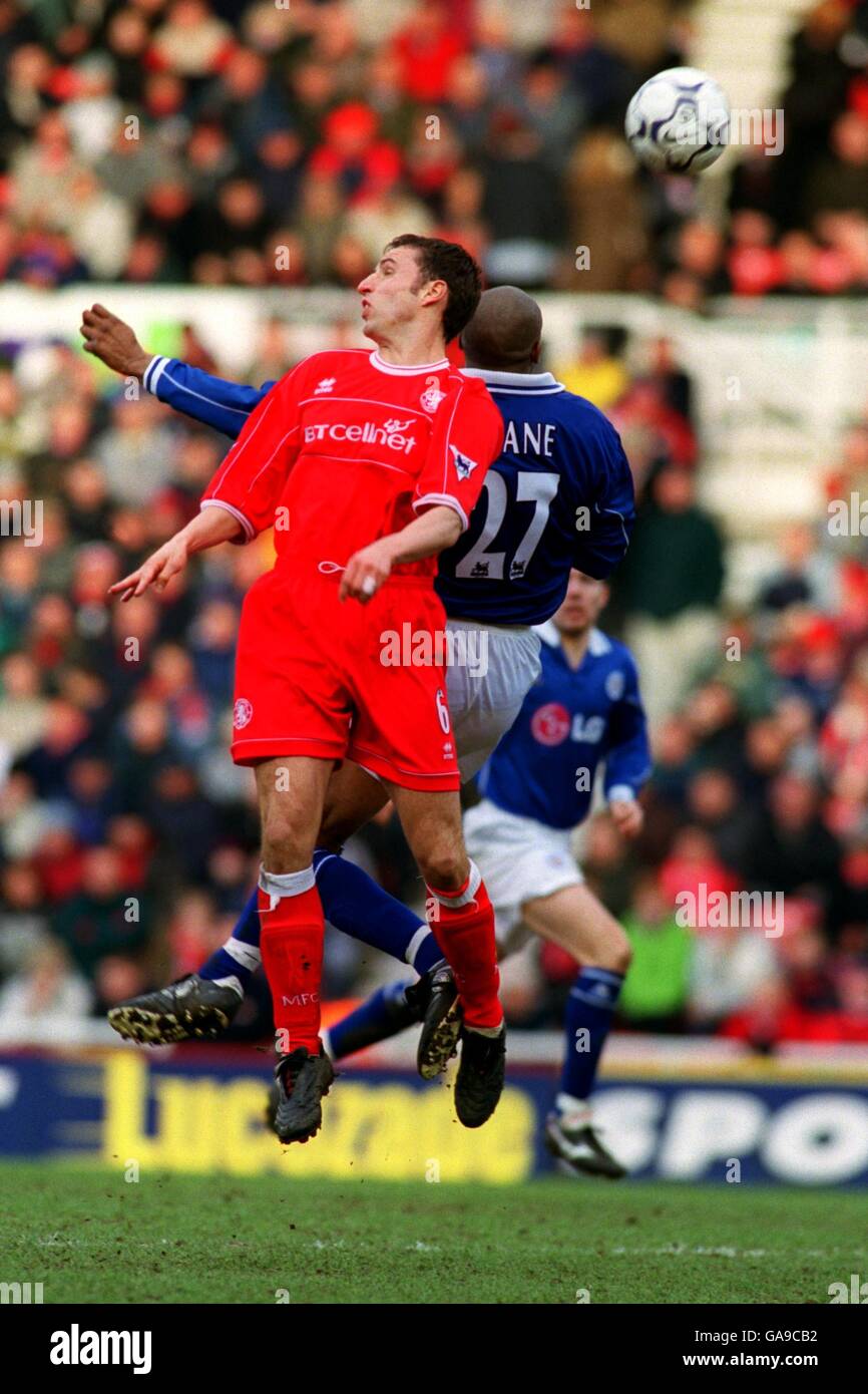 Middlesbrough's Gareth Southgate (l) jumps in the air for the ball with ...