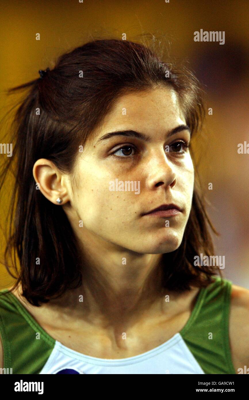 Slovenia's Anja Valant takes a break during the women's triple jump ...