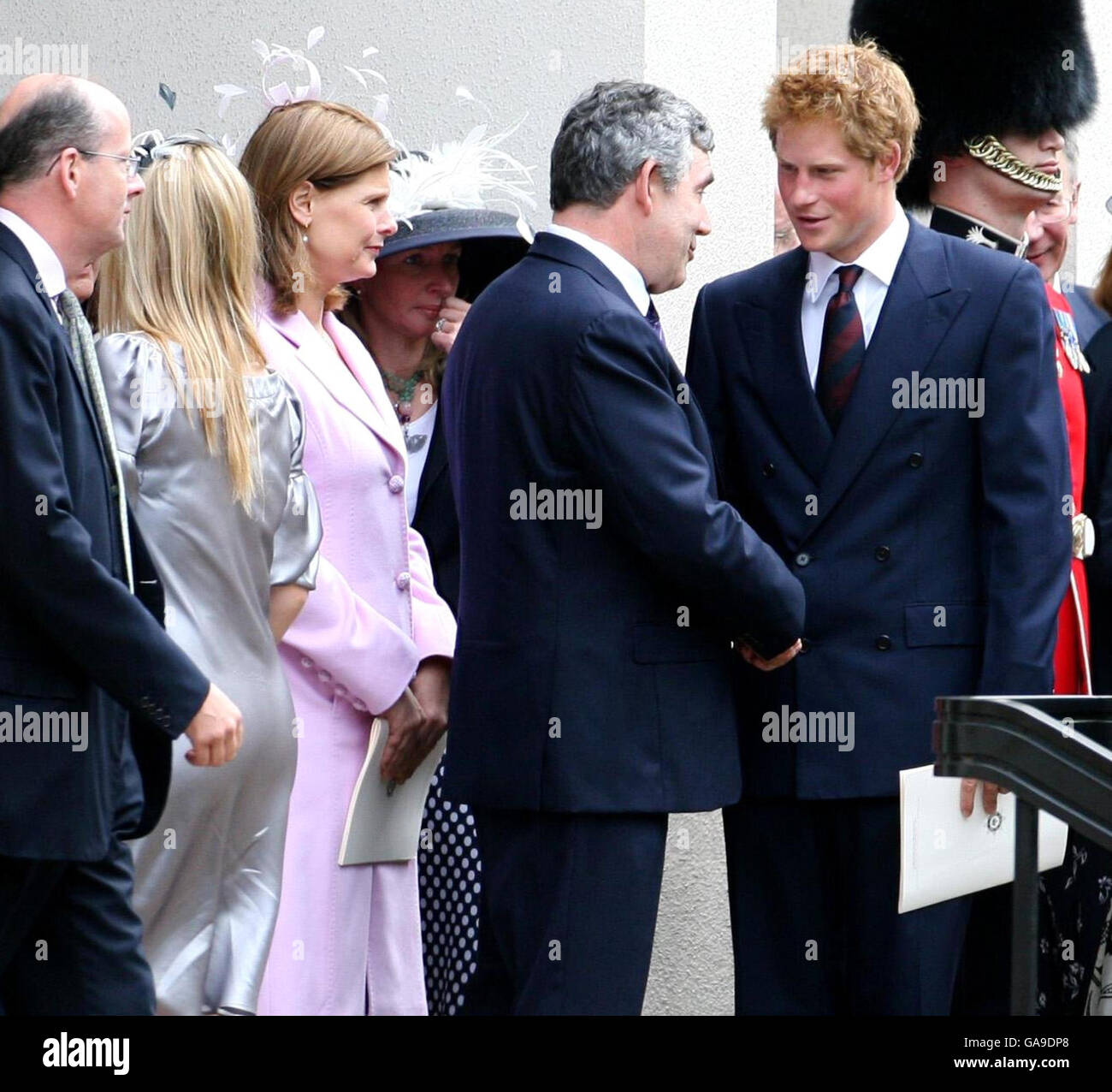 Prince Harry, Prime Minister Gordon Brown and his wife Sarah following ...