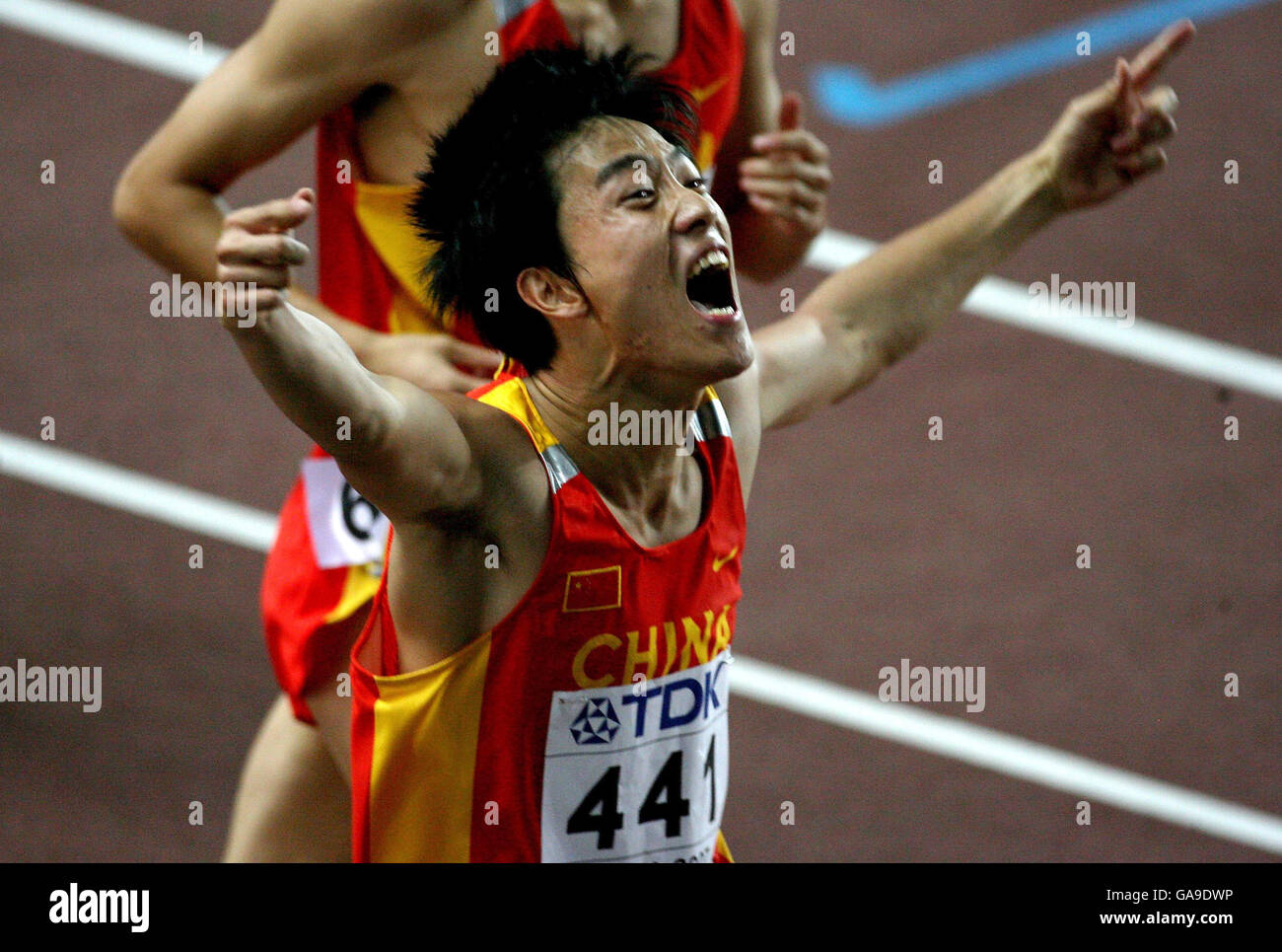 China's Xiang Liu celebrates winning the 110 metre hurdles during the ...