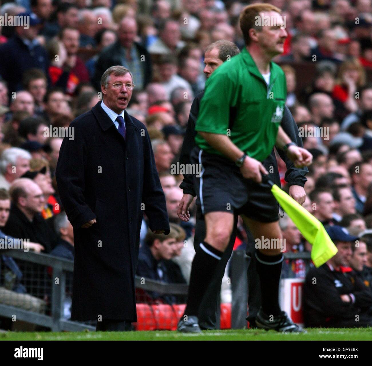 Manchester United Manager Alex Ferguson shouts at the linesman after an ...