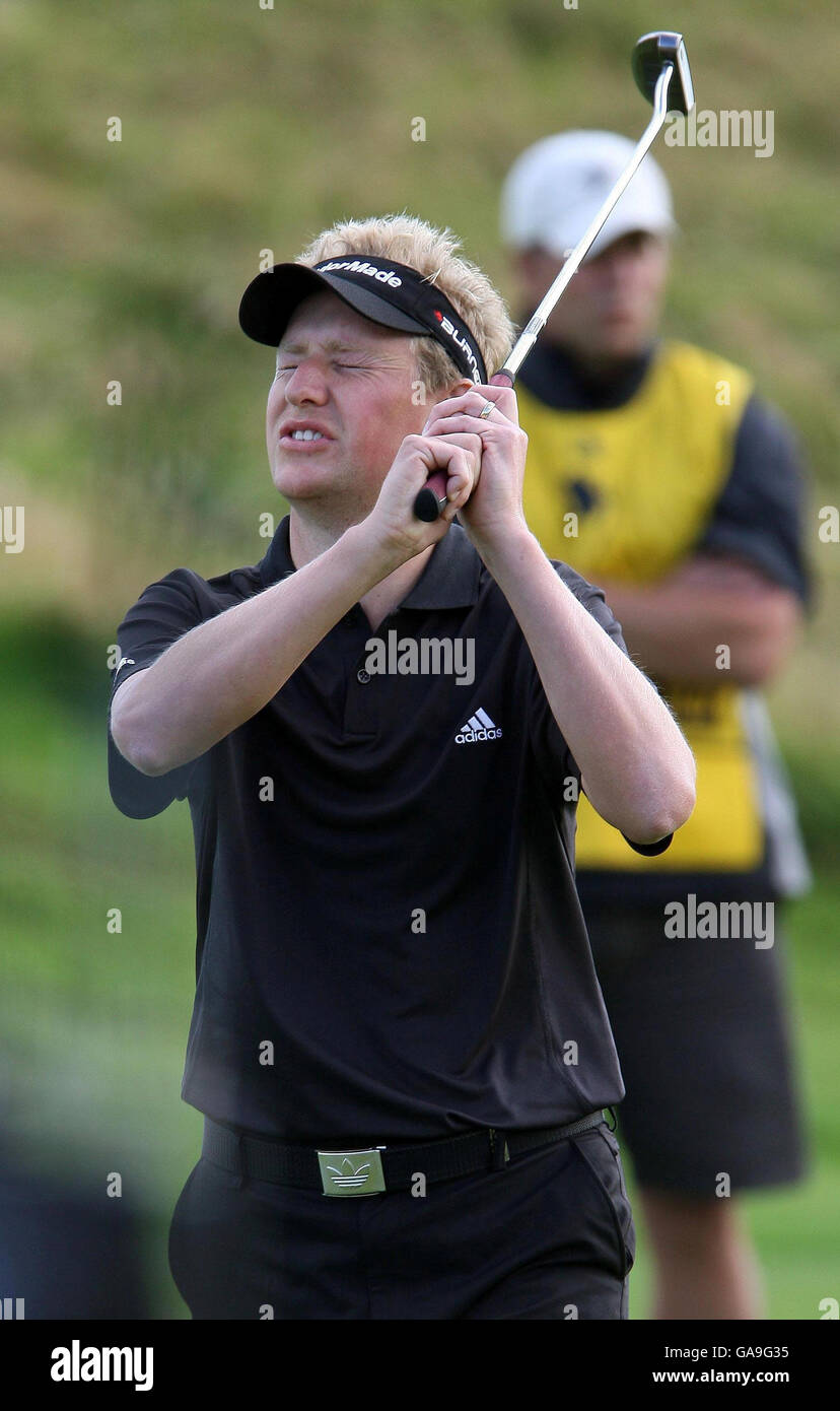 Simon Wakefield reacts after his first shot on the the 18th during the ...