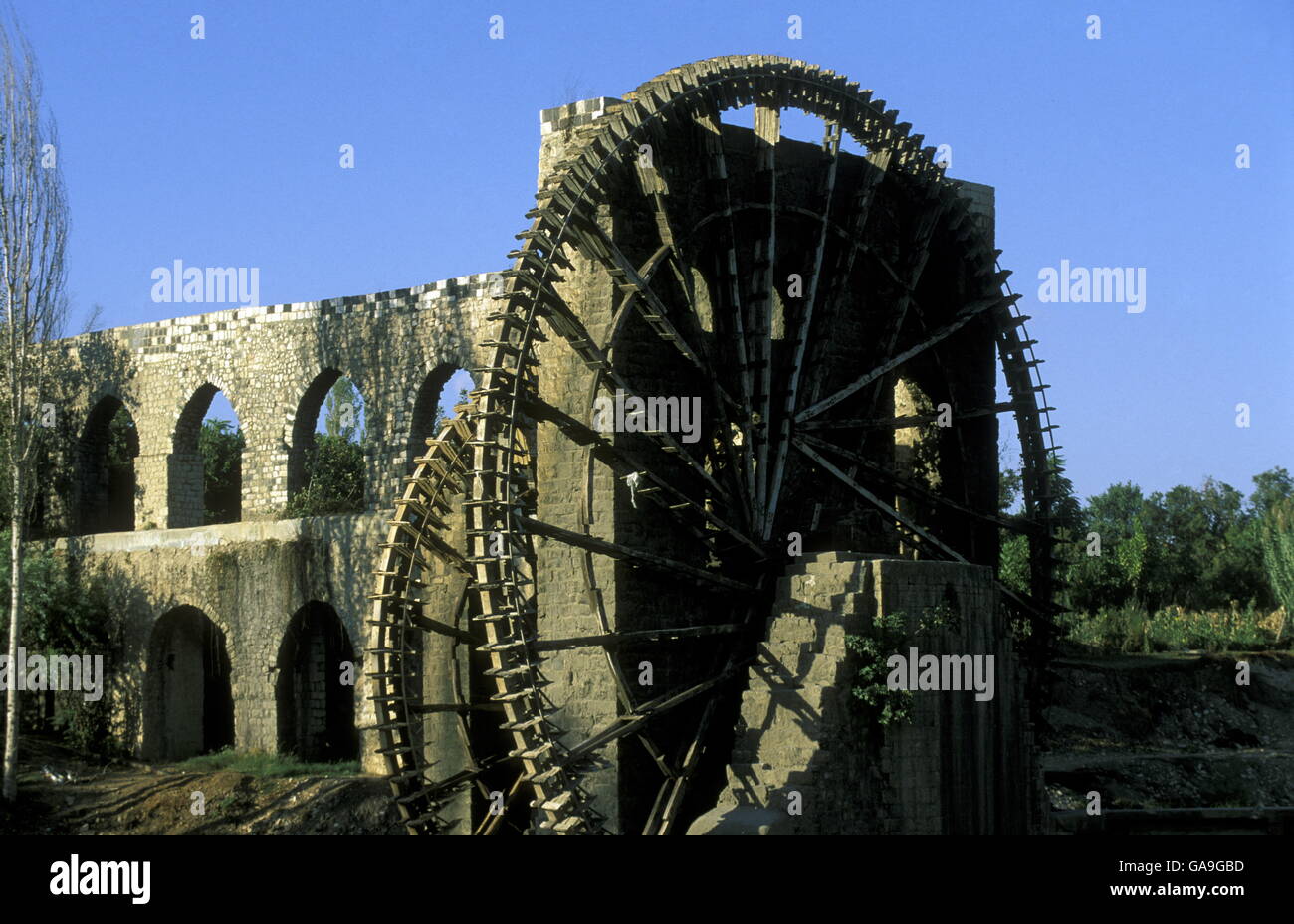 a traditional norias wooden water wheelsl in the city of Hama in Syria ...