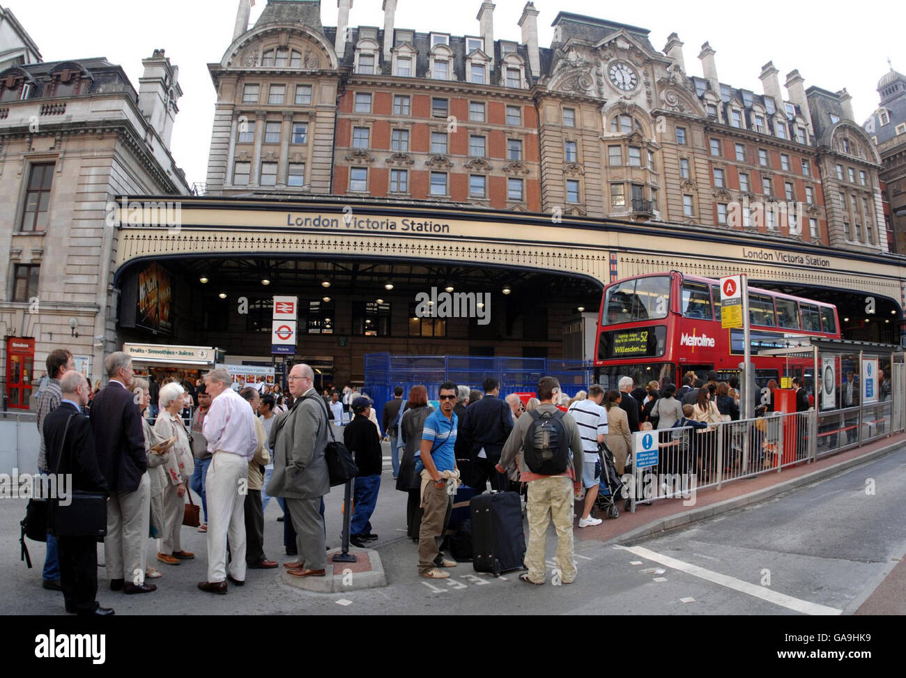 Tube strike. Commuters queue for buses at the Victoria Station after ...