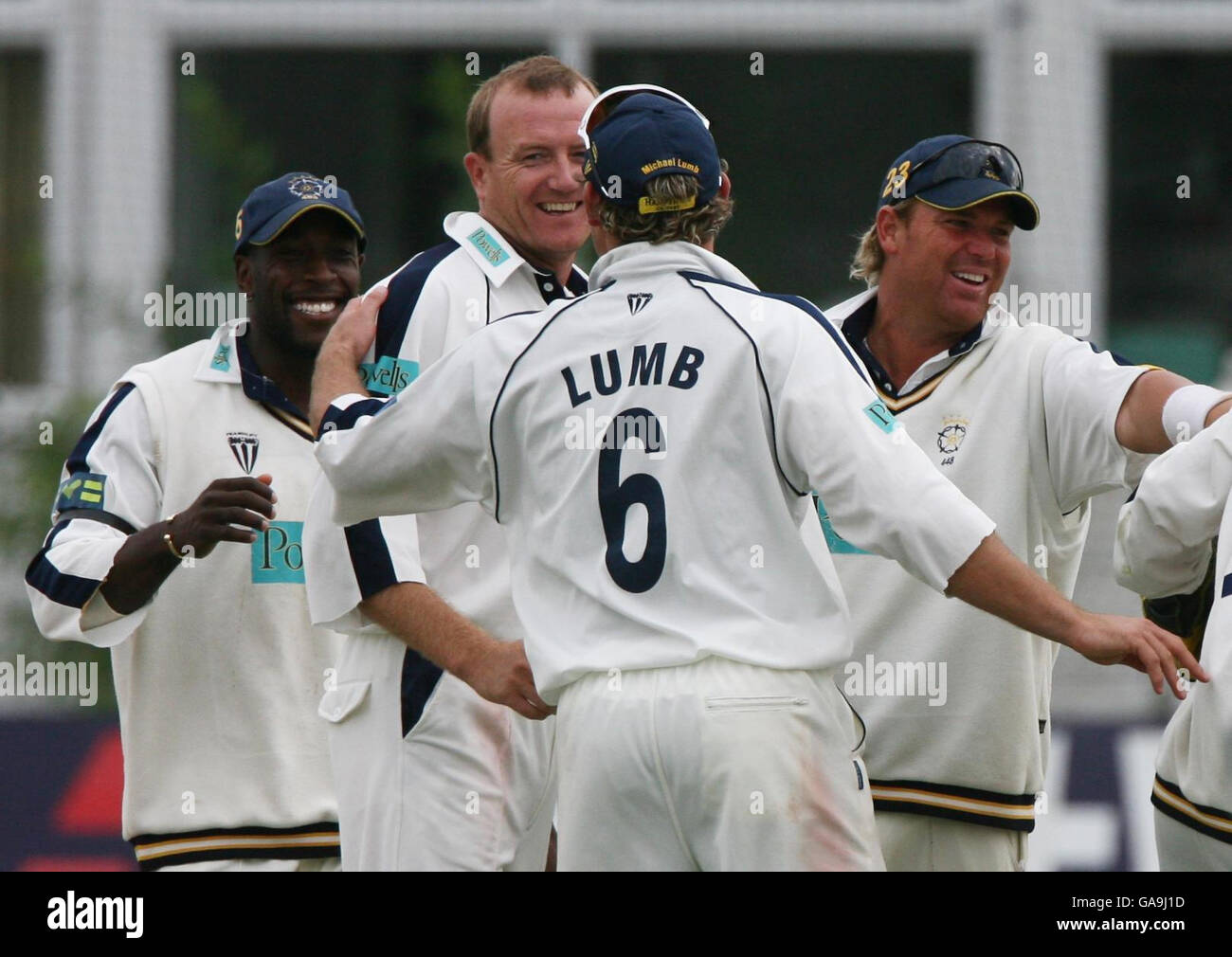 Hampshire bowler Shaun Udal (2nd left) celebrates with captain Shane ...