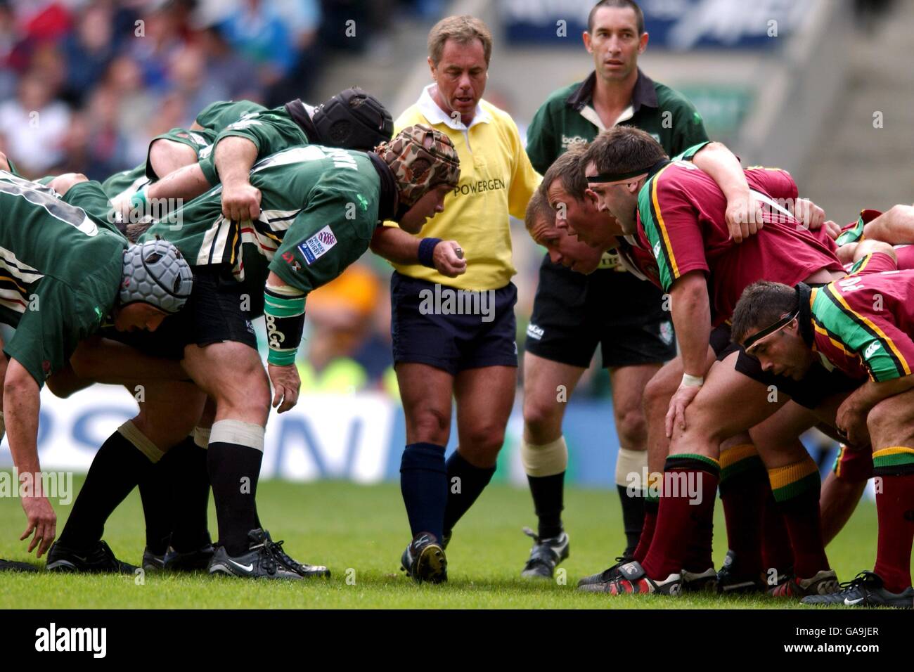 Referee Steve Lander brings the two packs together for a scrum Stock ...